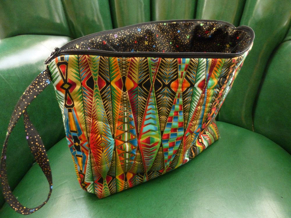 The Kittalog: Lesson Learned: Busy Fabrics Don't Need Fancy Quilting