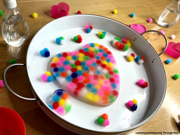 Learning and Exploring Through Play: Frozen Pom Pom Hearts