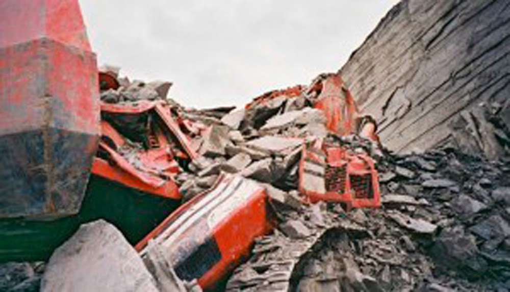 Mining Mayhem: RH120 Under Highwall Collapse