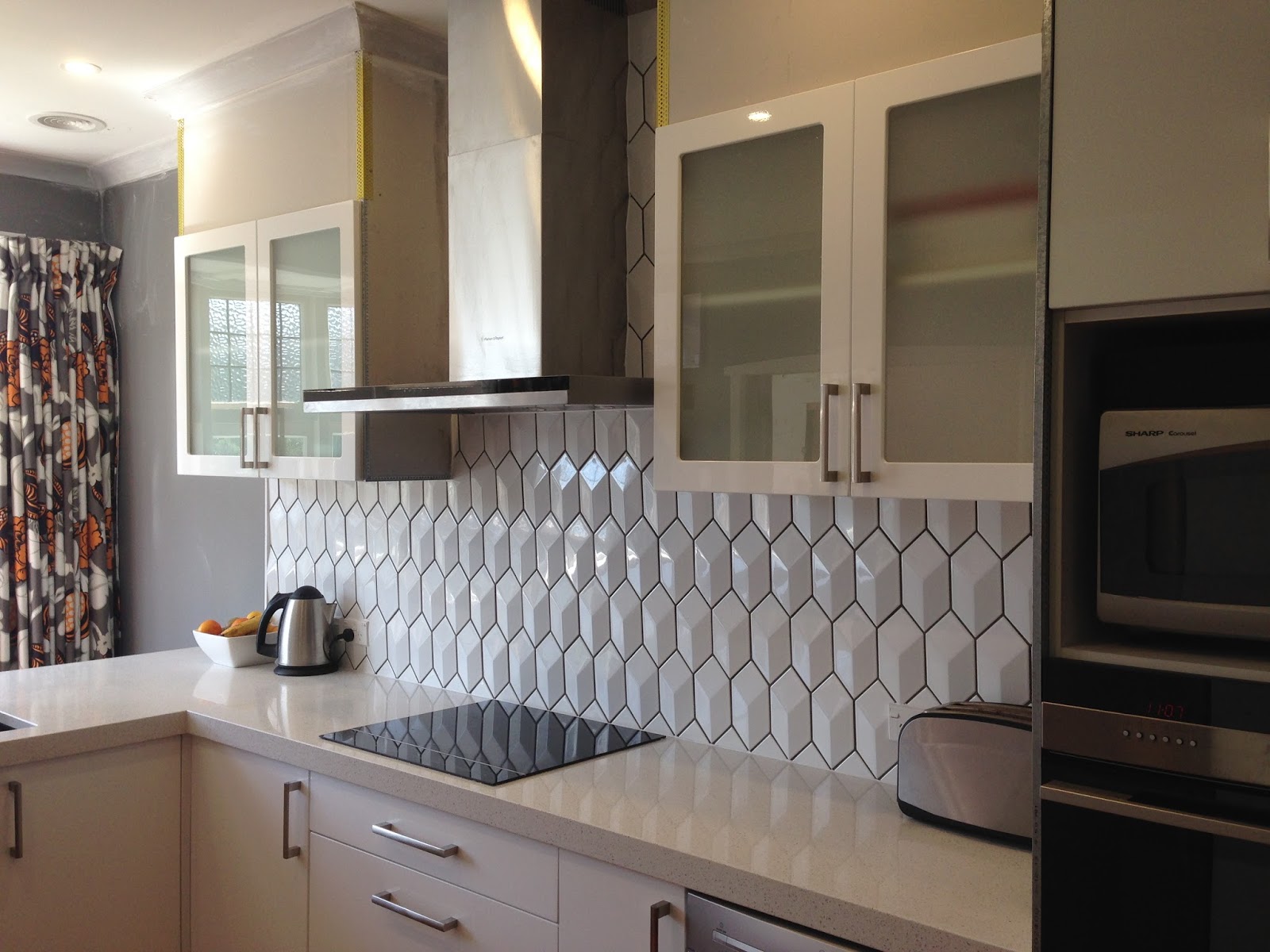 Mrs Cake: A geometric tiled backsplash