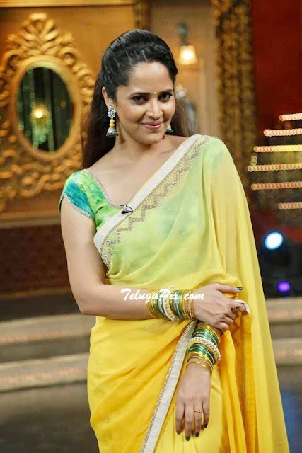 Anasuya Bharadwaj Latest Stills in Yellow Saree