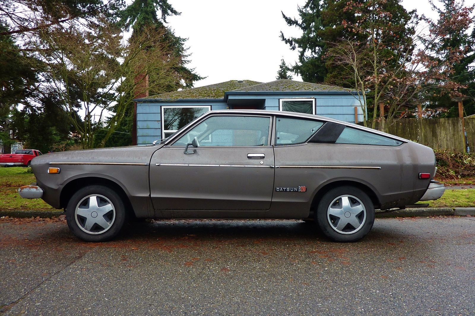 Seattle's Parked Cars: 1976 Datsun B210