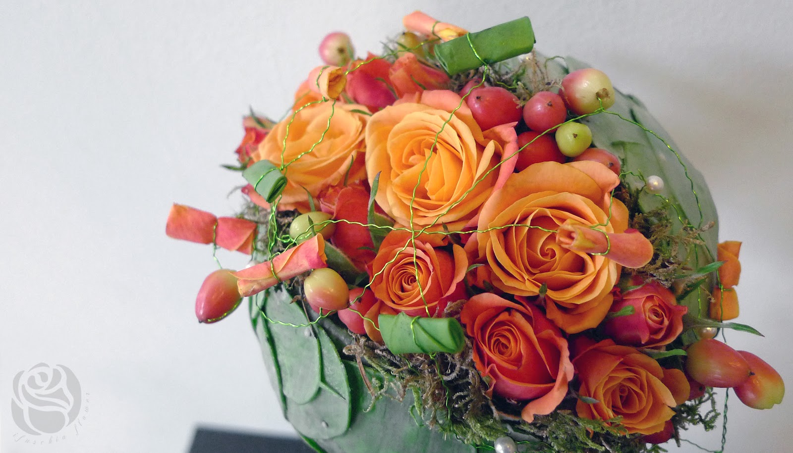 ifuschia flower: Sphere(Ball) shaped flower arrangement/ bouquet