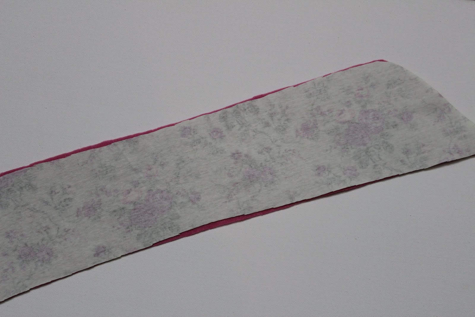 Lay both the fabrics on top of each other ( right sides together).