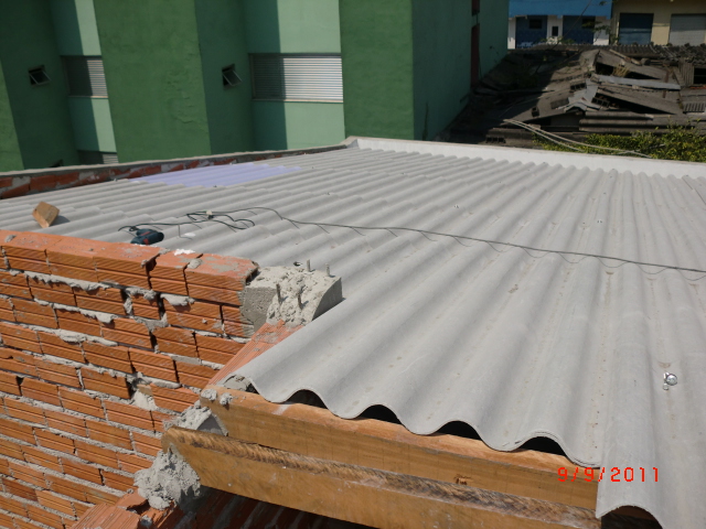 Sobrados Rua Garaú: Telhado, Caixas D'água e Reboco das Fachadas