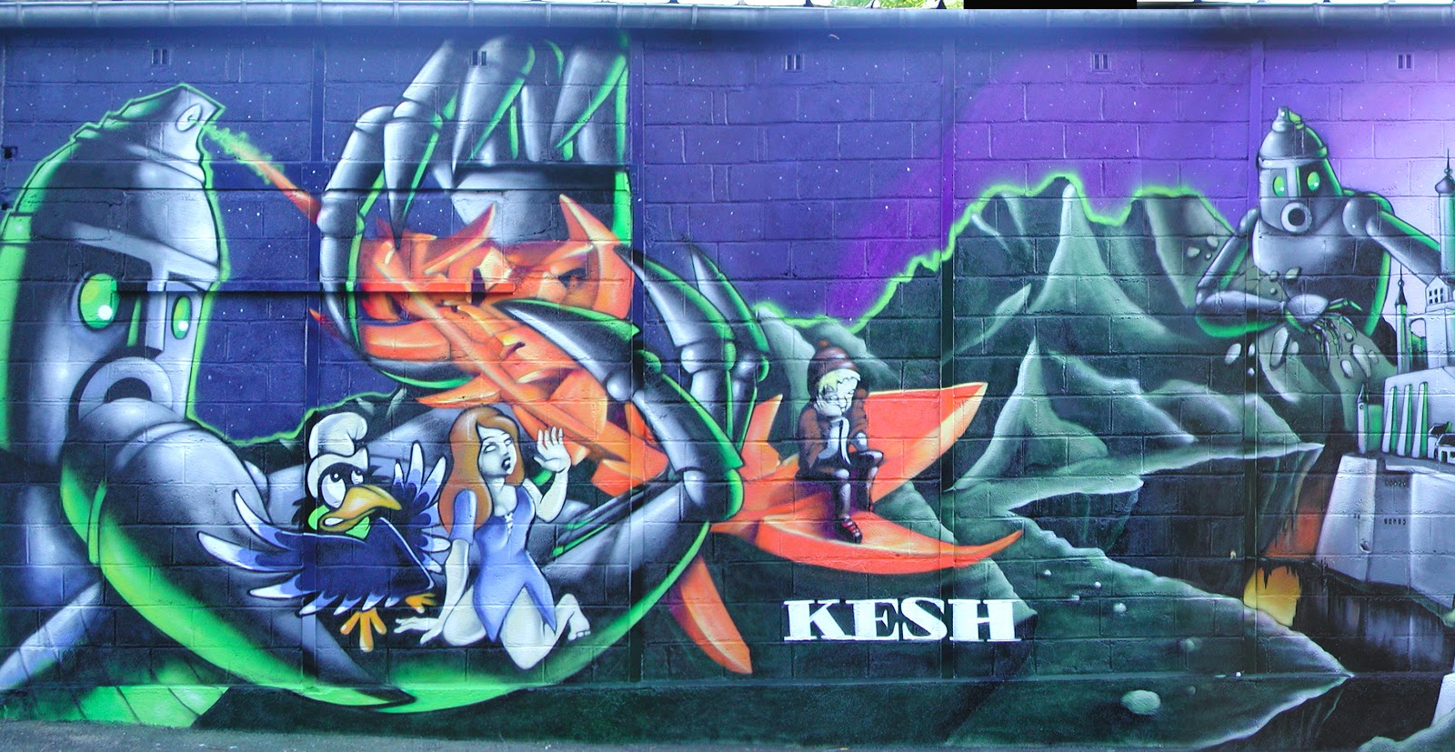 Graffiti sur mur avec personnage et paysage en France