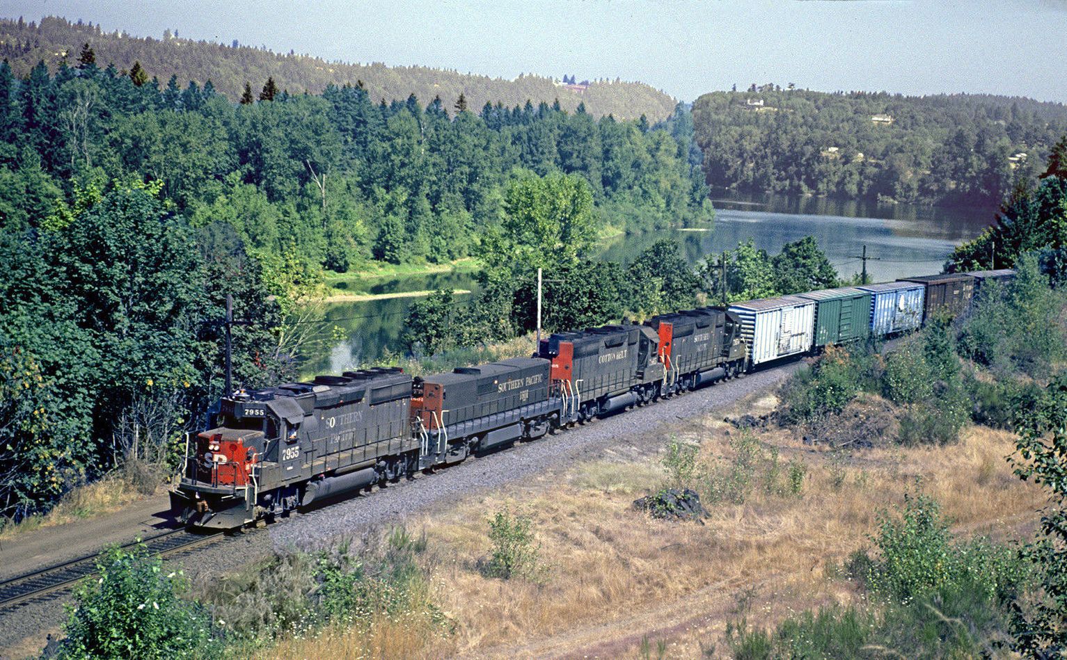 transpress nz: Southern Pacific GP40-2 plus a slug lead a freight train ...