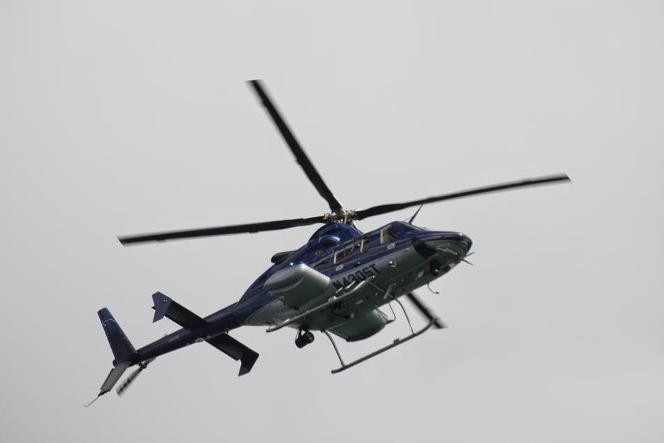 Michigan Exposures: A State Police Helicopter Passes Overhead