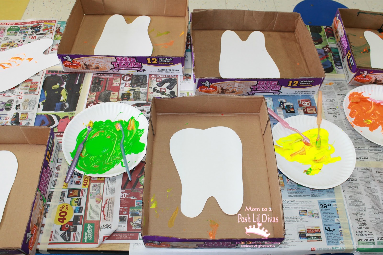 I cut out a large tooth shape from card stock for the children to paint ...
