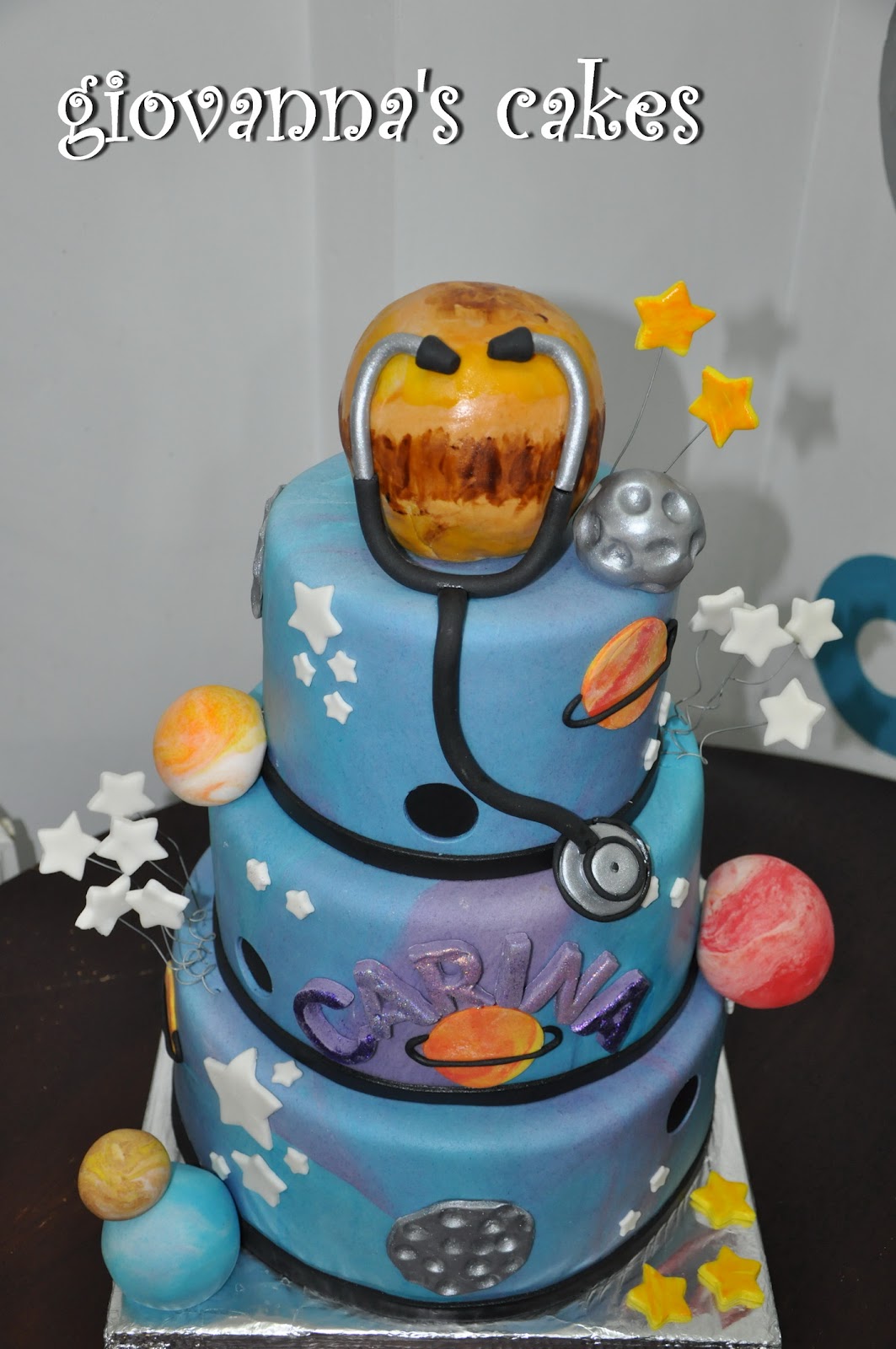 giovanna's cakes: Planets and stethoscope birthday cake
