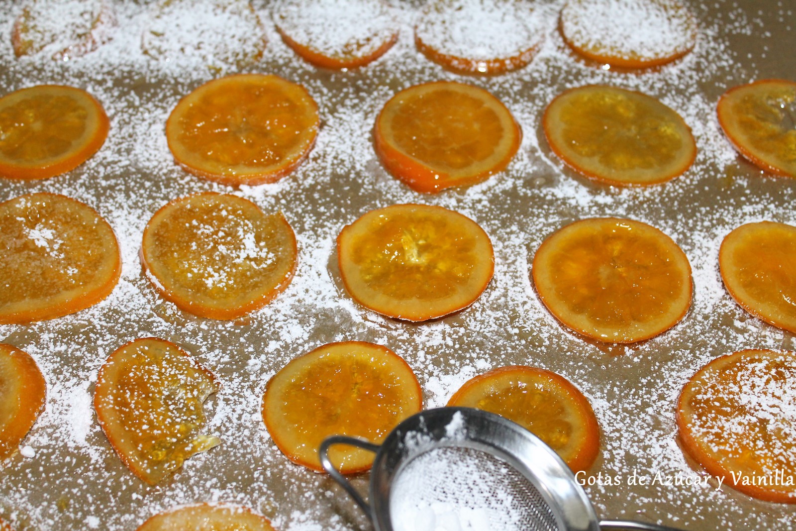 Gotas de Azúcar y Vainilla: Naranjas confitadas.