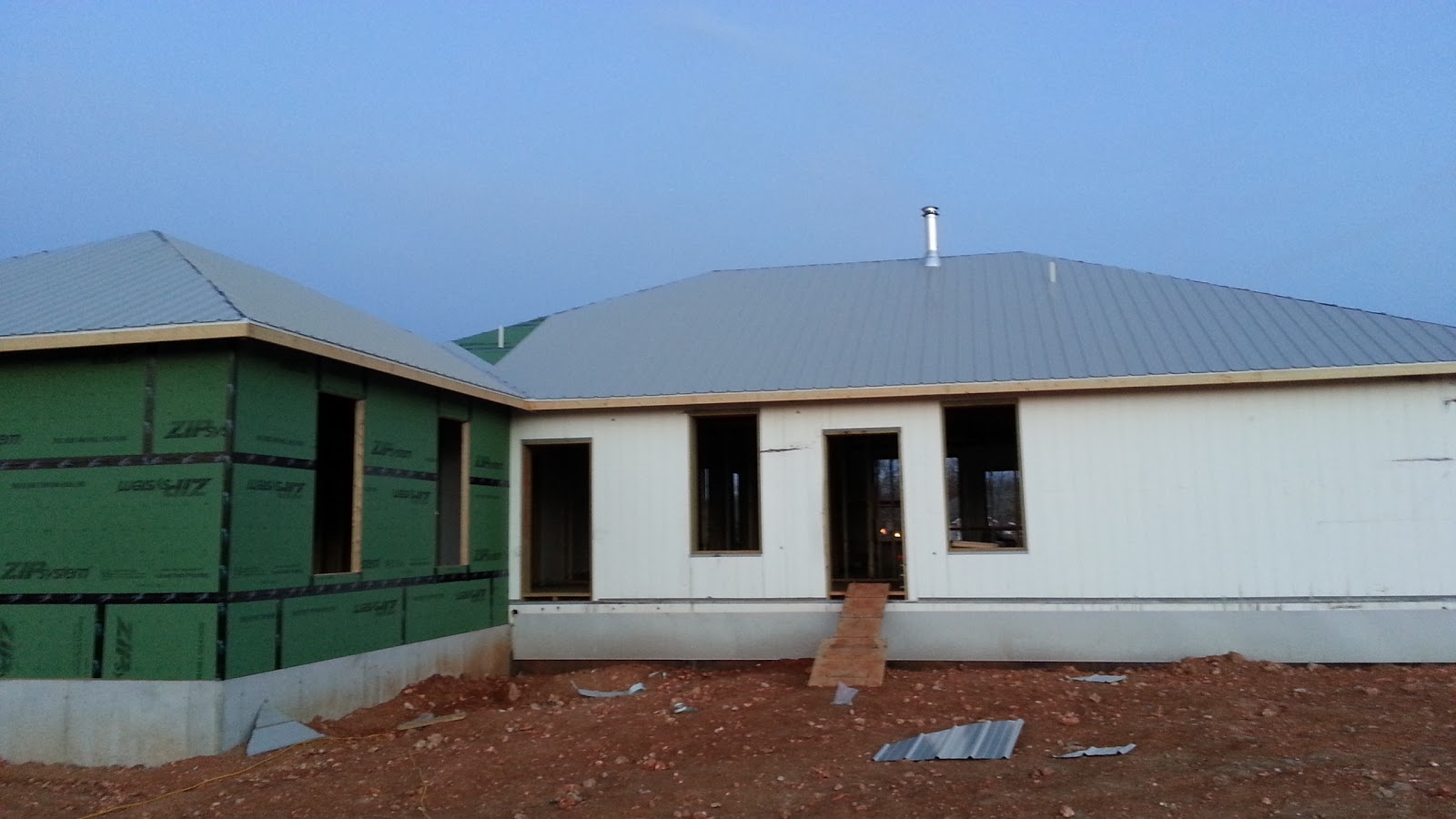Insulated Concrete Forms TF Systems house: The metal roof is on
