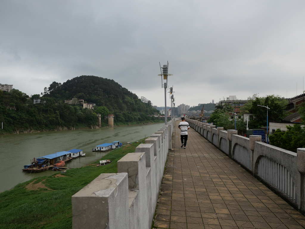 Life Moving On The Gui River Western Bank Wall in Wuzhou - Isidor's Fugue