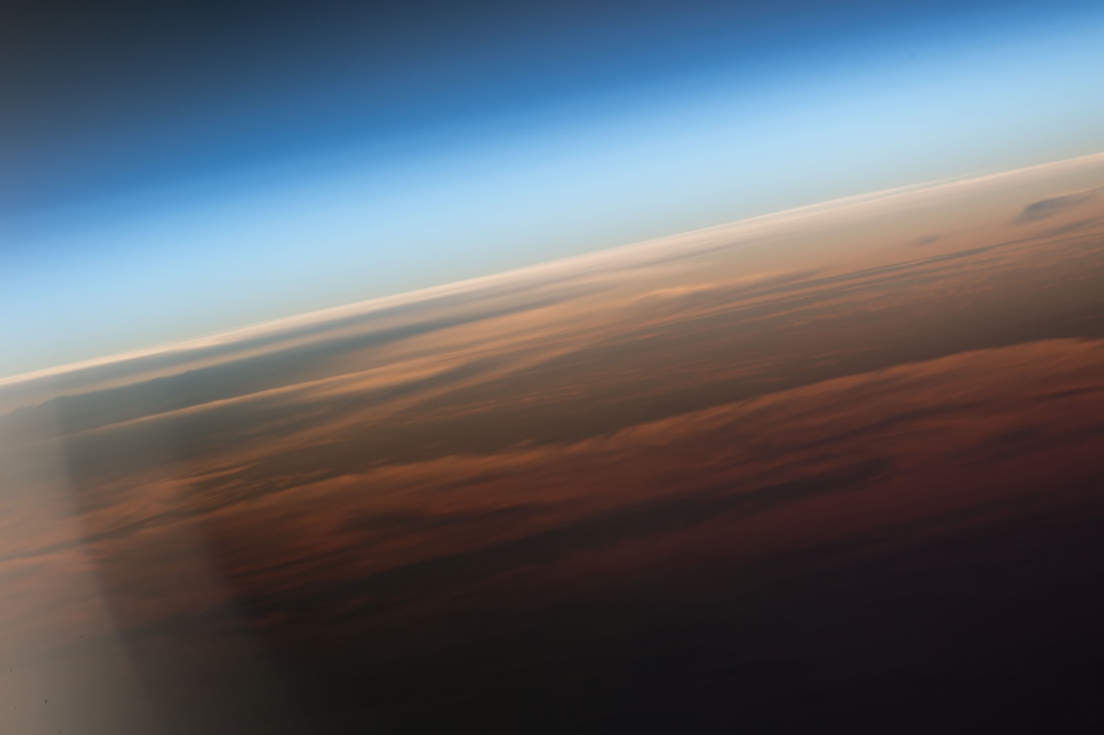 Earth's Atmosphere, Sunrise and Clouds over Atlantic Ocean seen from ...