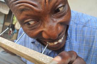 Photos: Nigerian man has the strongest teeth in Africa