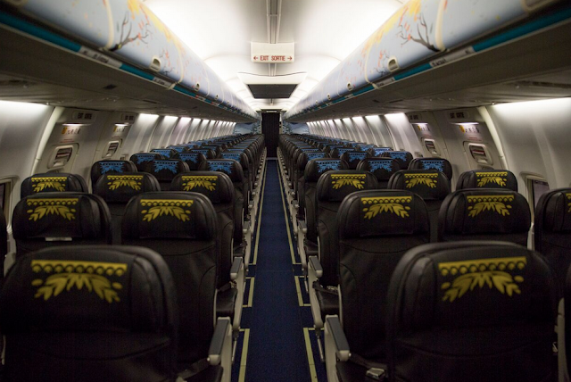 WestJet's Disney Frozen themed plane - Disney magic inside and out ...