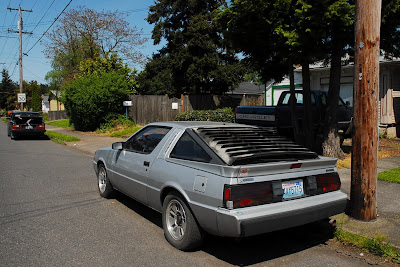 OLD PARKED CARS.: 1987 Mitsubishi Starion.