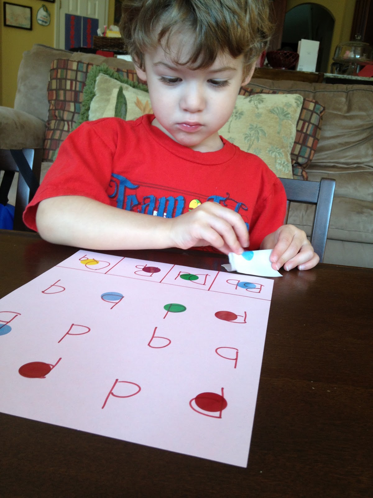 Two Much Fun: b,d,p,q Identification Game and Assessment