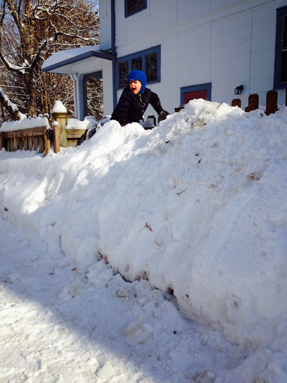 Alden and Soren Koschmann: 4 inches of ice beneath 4 feet of snow...