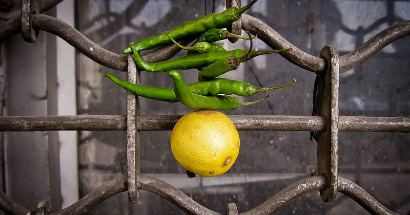 INDIAN SUPERSTITIONS: TRUTH BEHIND HANGING LEMON AND CHILLIES