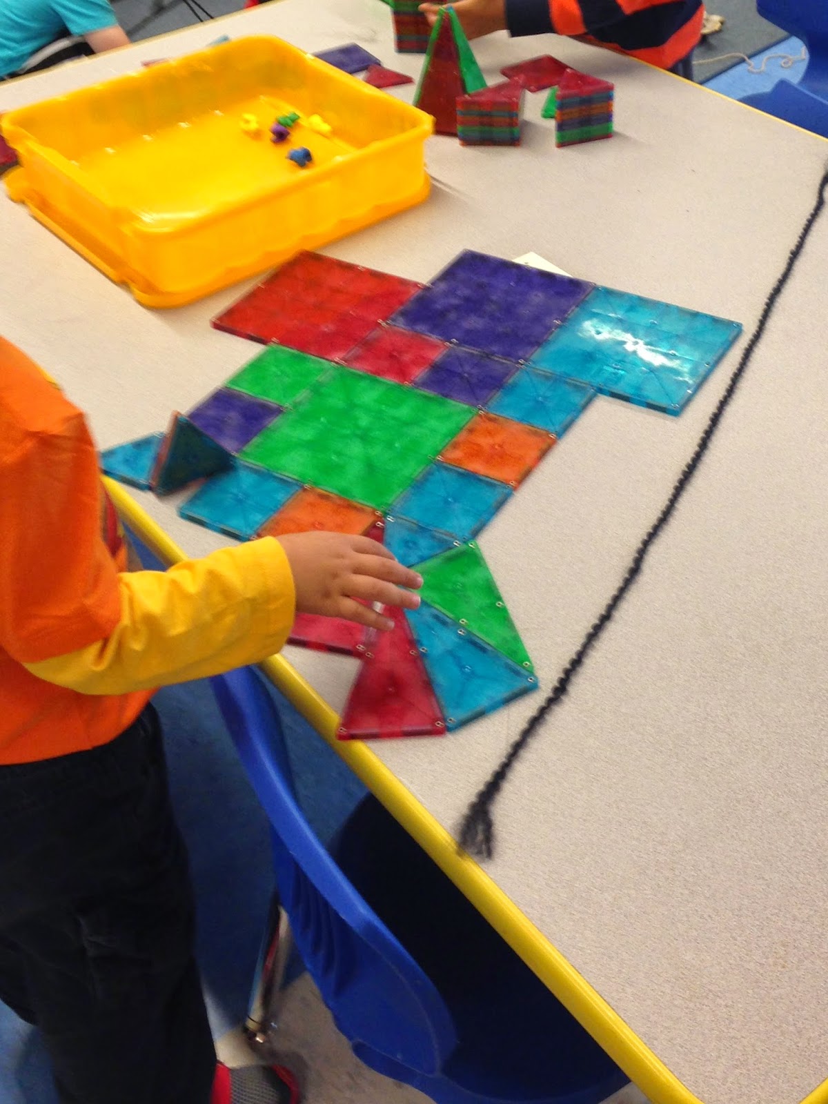 Pondering Preschool: What can we do with yarn?