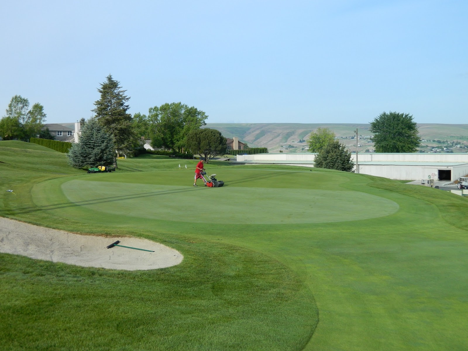 LGCC Golf Maintenance: Walk mowing greens