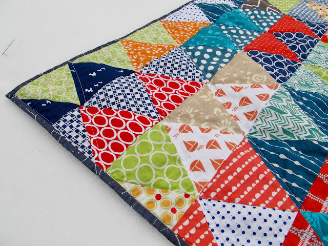 Six White Horses: Triangle Patchwork Baby Quilt