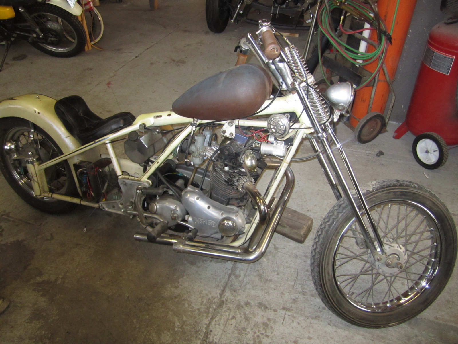 FRONT ST CYCLE: 1974 Norton Commando Chopper