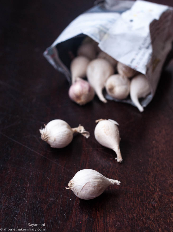 Rosun, bori die Lal shaak Bhaja / Sauteed Red Amaranth with garlic and ...