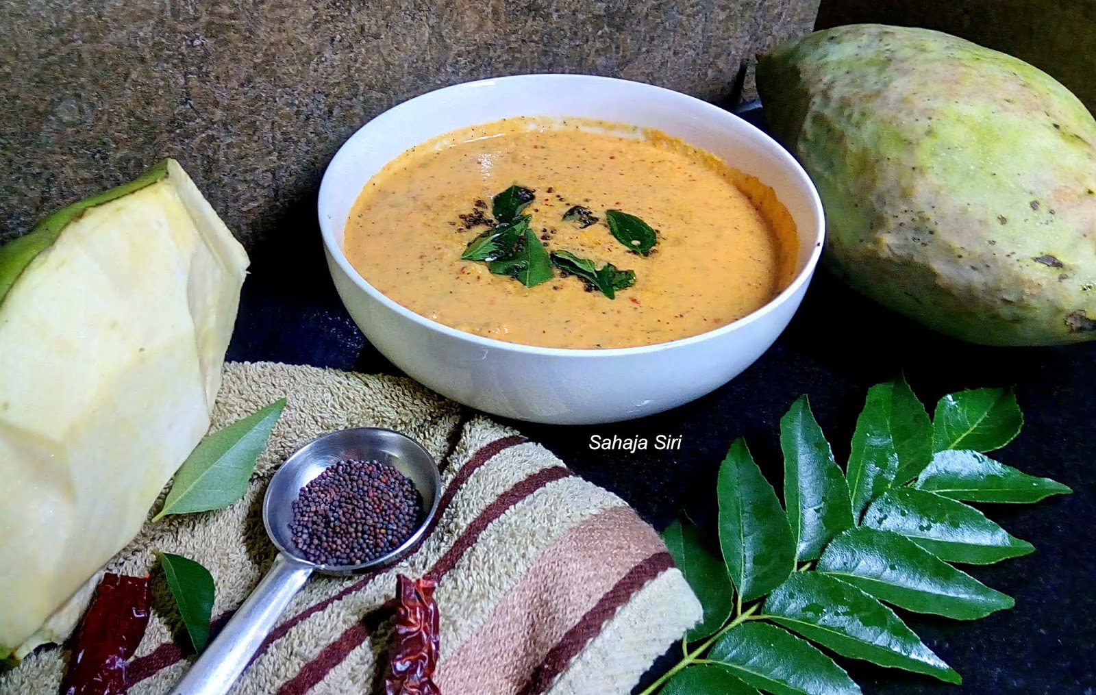 Mavinakai Sasive/ Karmani or Raw Mango Mustard flavored gravy