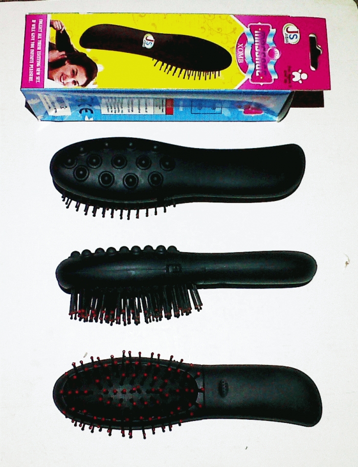 Alat penyisir rambut sekaligus pijat anti rontok elektrik