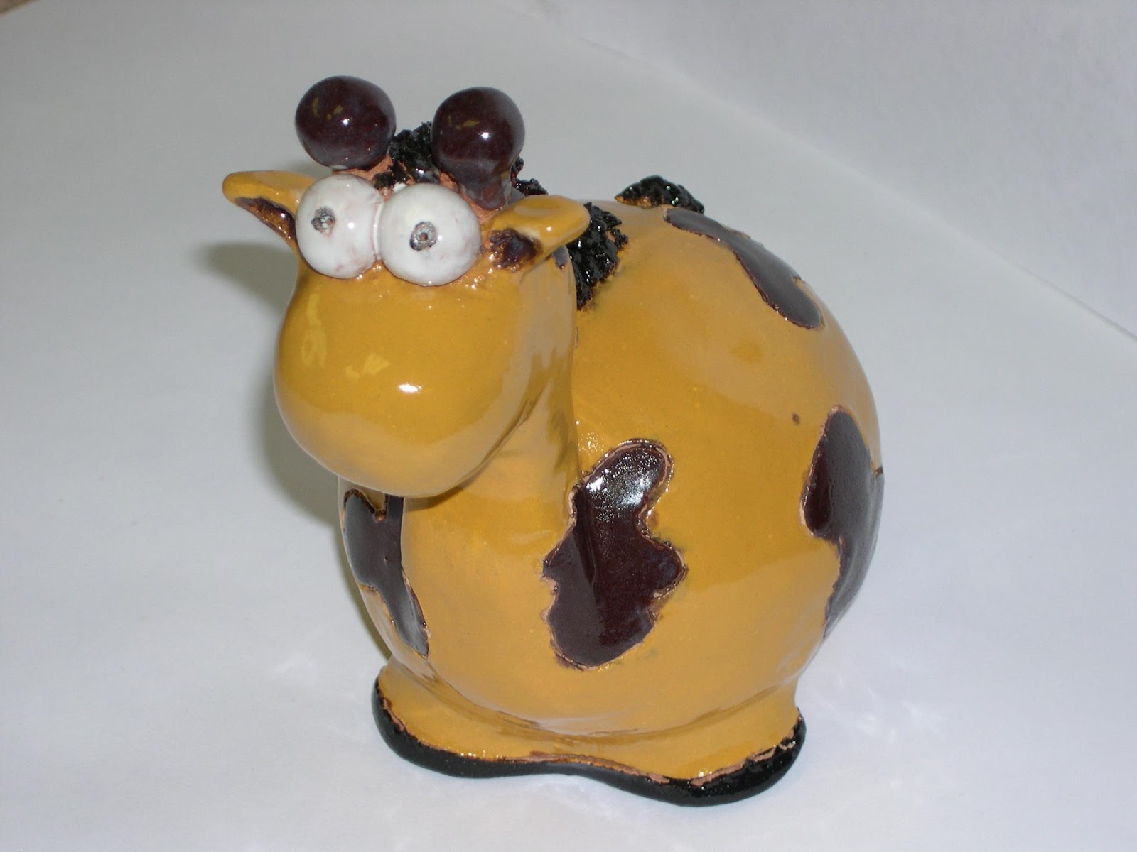 Clay shares: Pinch pot animals shakers