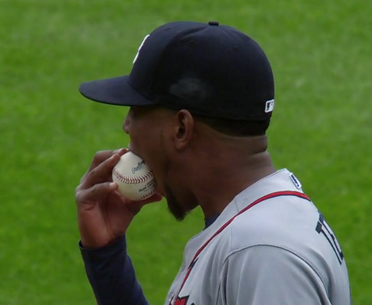 Julio Teheran takes bite out of baseball, literally (Video) ~ Holdout ...