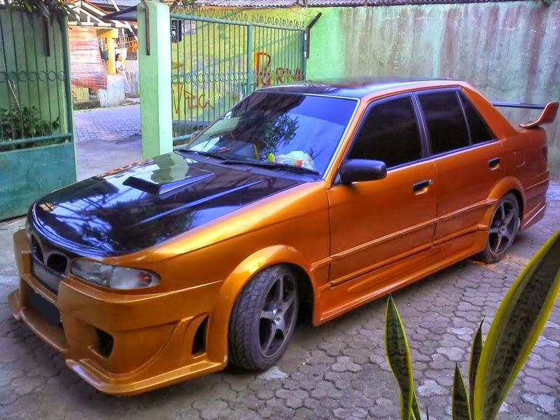 Modifikasi Mobil Sedan Ford Laser Terbaru
