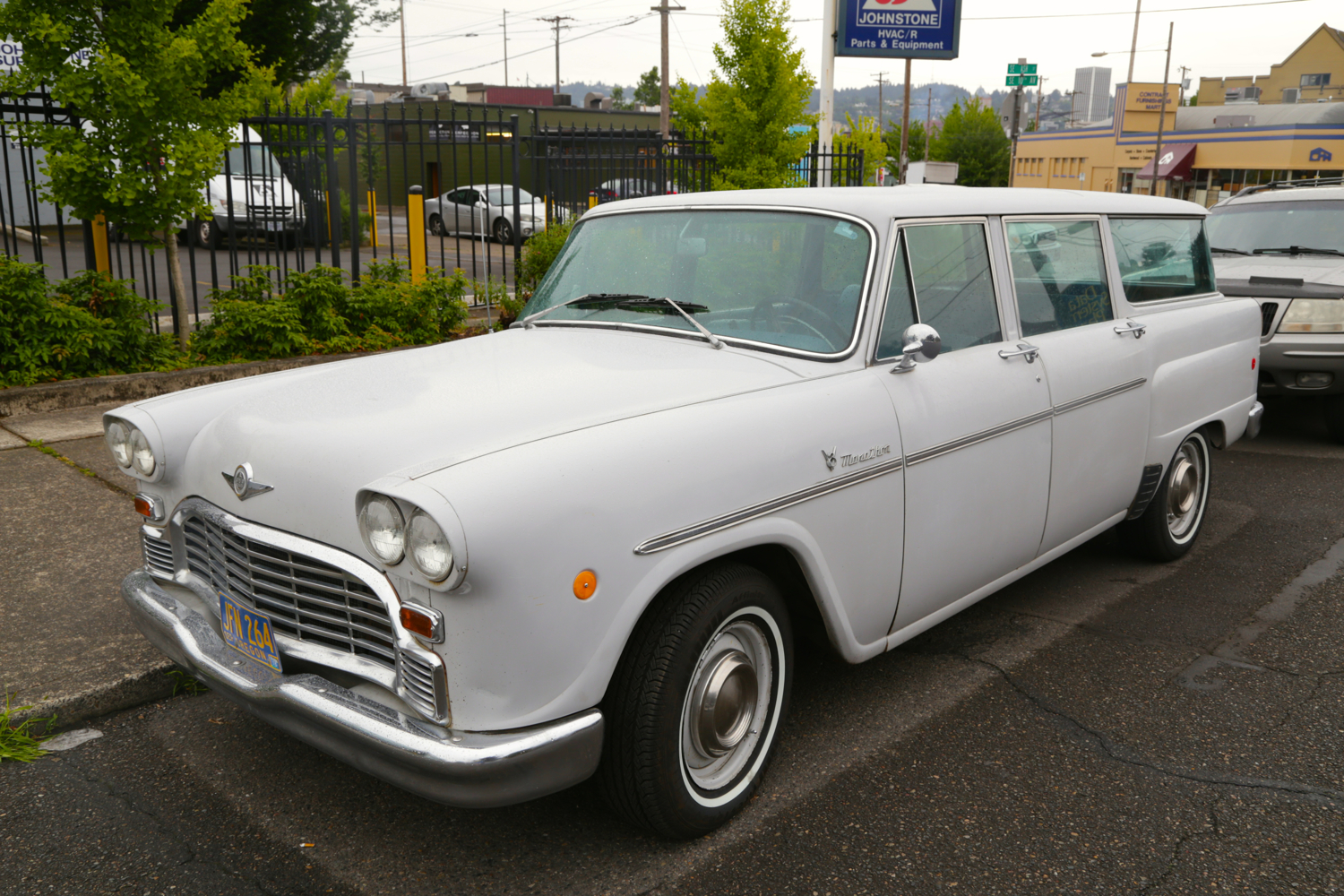 OLD PARKED CARS.: 1970 Checker Marathon Wagon.