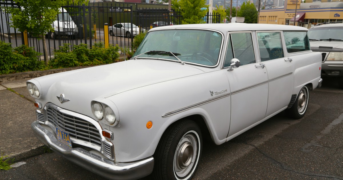 OLD PARKED CARS.: 1970 Checker Marathon Wagon.