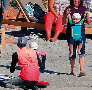 Princess Charlene and her children on the beach in Corsica