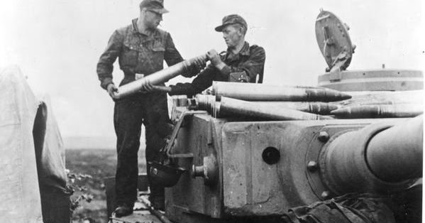 World War II History: A German crew loading rounds into a Tiger I heavy ...