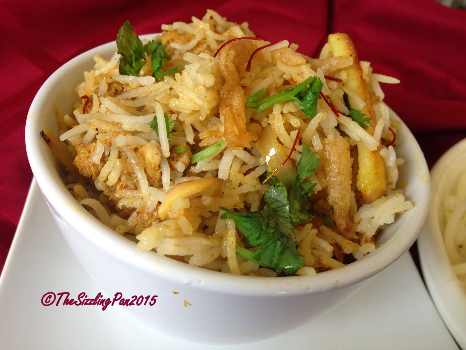 The Sizzling Pan: Layered Chicken Biryani: Remade with new pictures!!