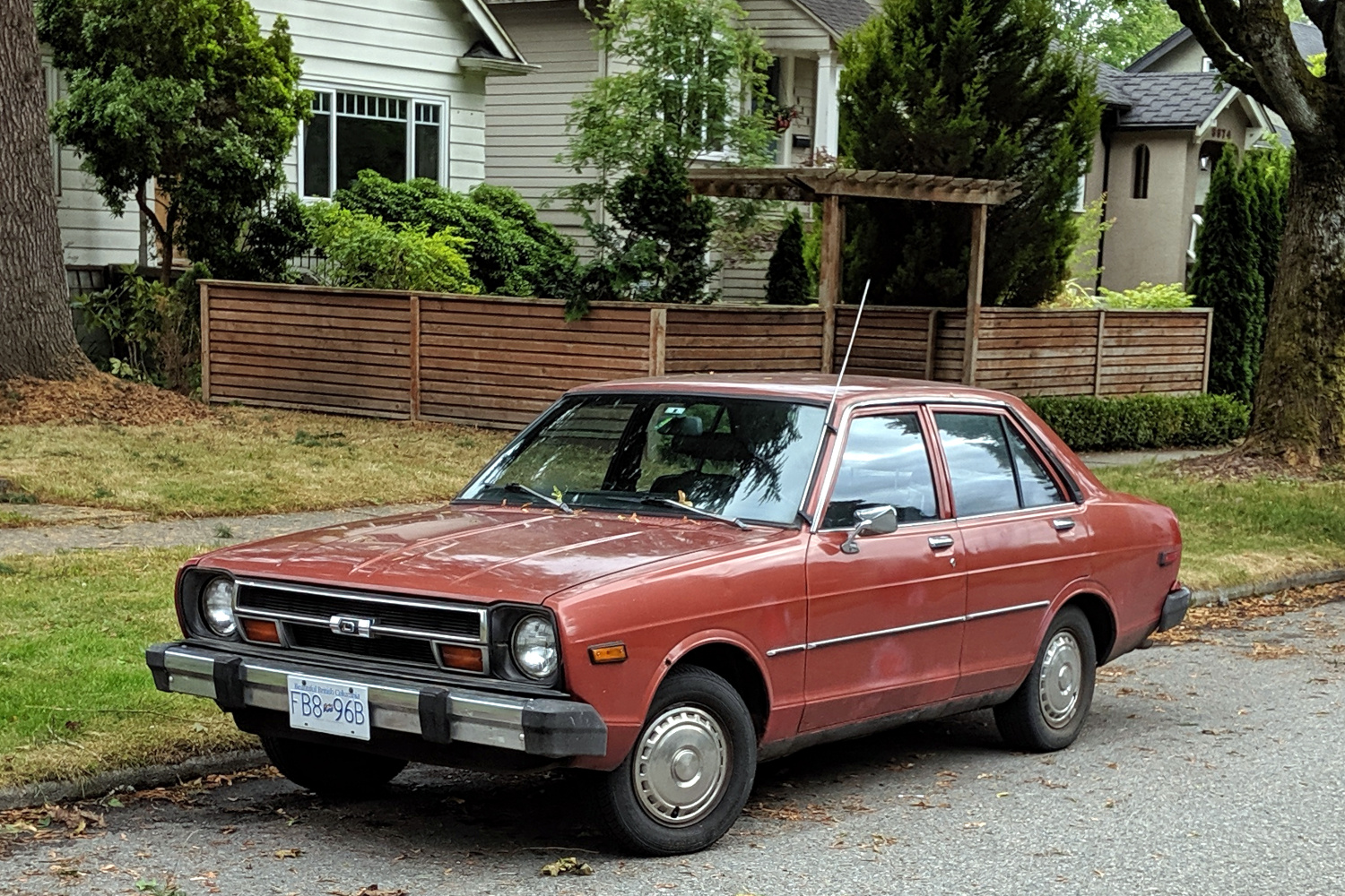 Old Parked Cars Vancouver: 1979 Datsun 210 Sedan