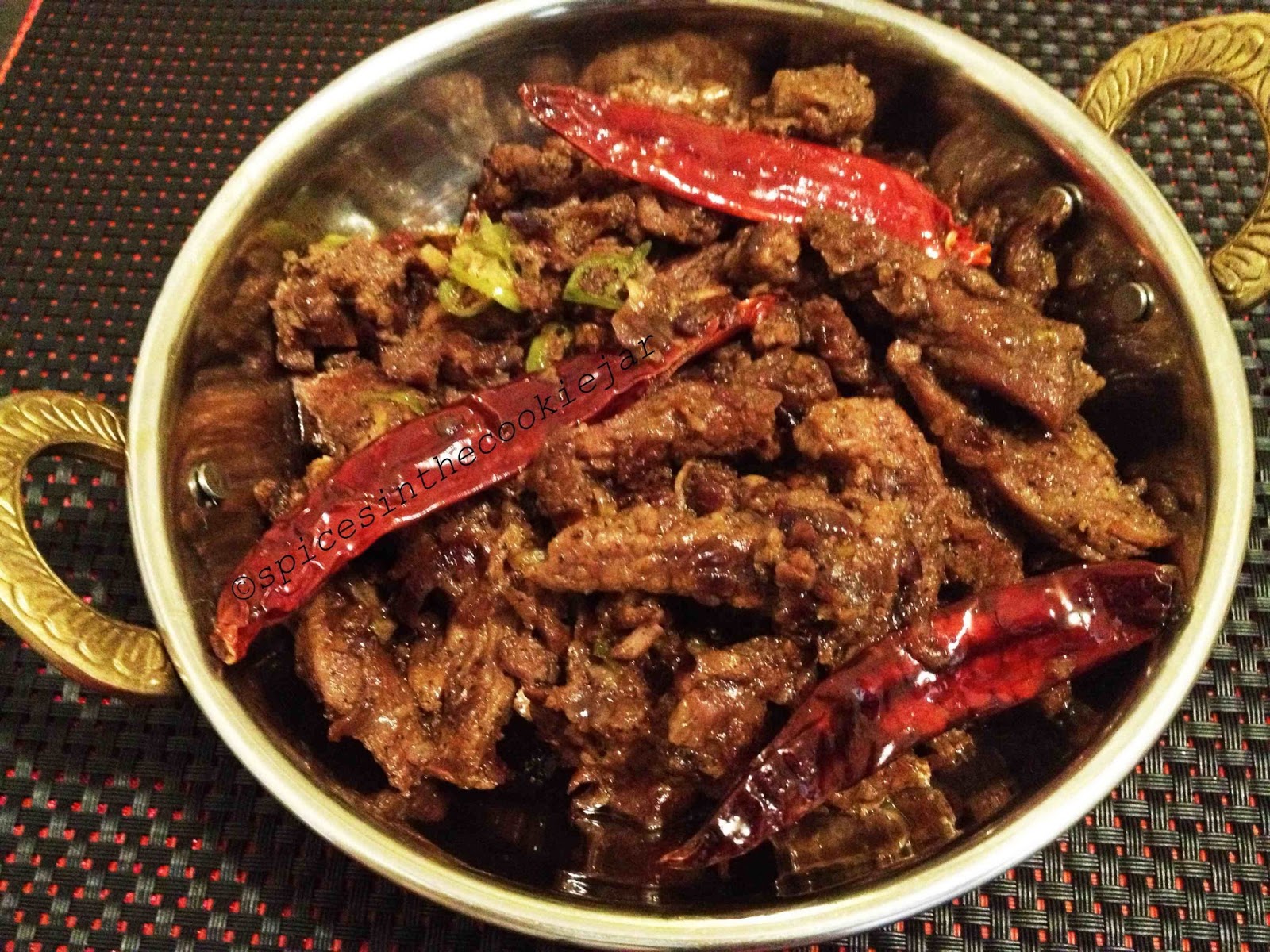 In a non-stick pan heat oil and fry onions, ginger and garlic till ...