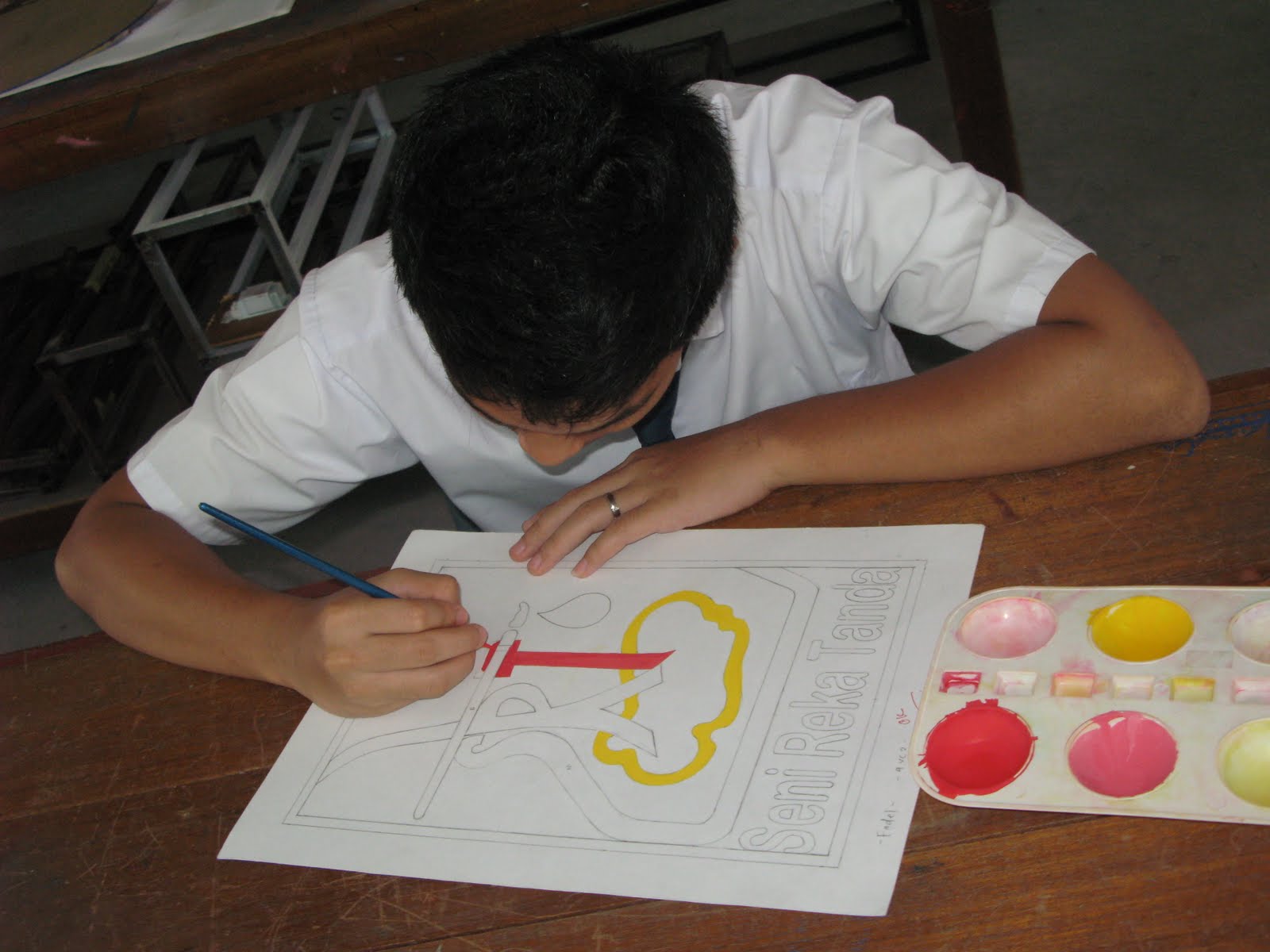 Seni Reka Tanda SMKSI: LOGO