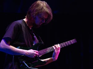 The Guitar Column: An Interview with Fusion Jazz Guitarist Alex Machacek