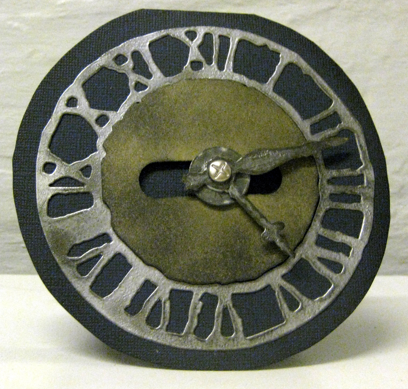 EttenA's: Kort som et ur