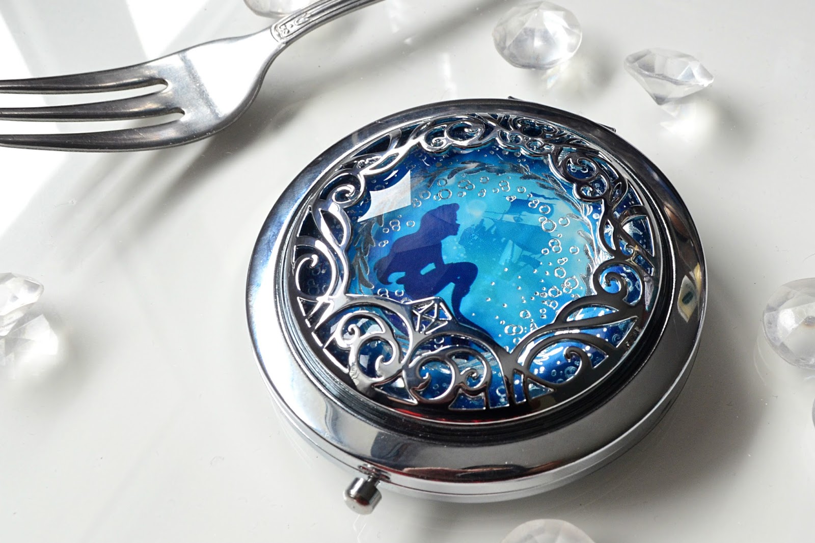 Found a GORGEOUS Ariel mirror compact at Hot Topic! : r/MakeupAddiction