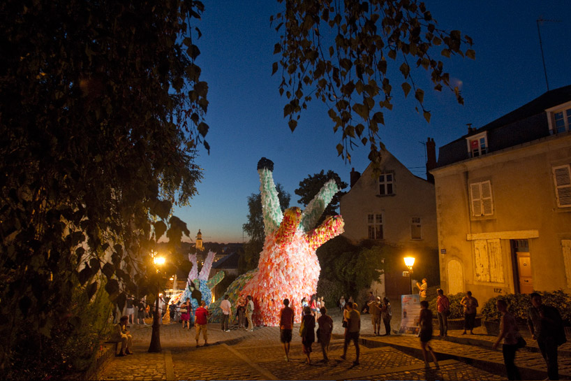 Kuweight 64: ART - GIANT COLORFUL SLUGS WITH PLASTIC BAGS