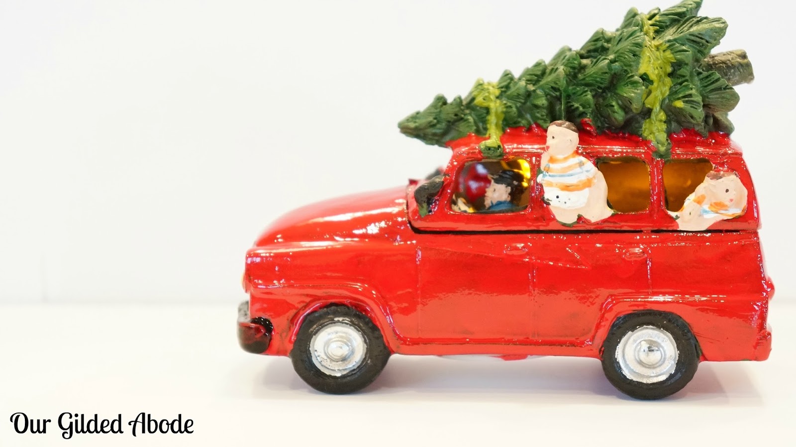 Our Gilded Abode: Making Your Own Red Vehicle with Tree Decor