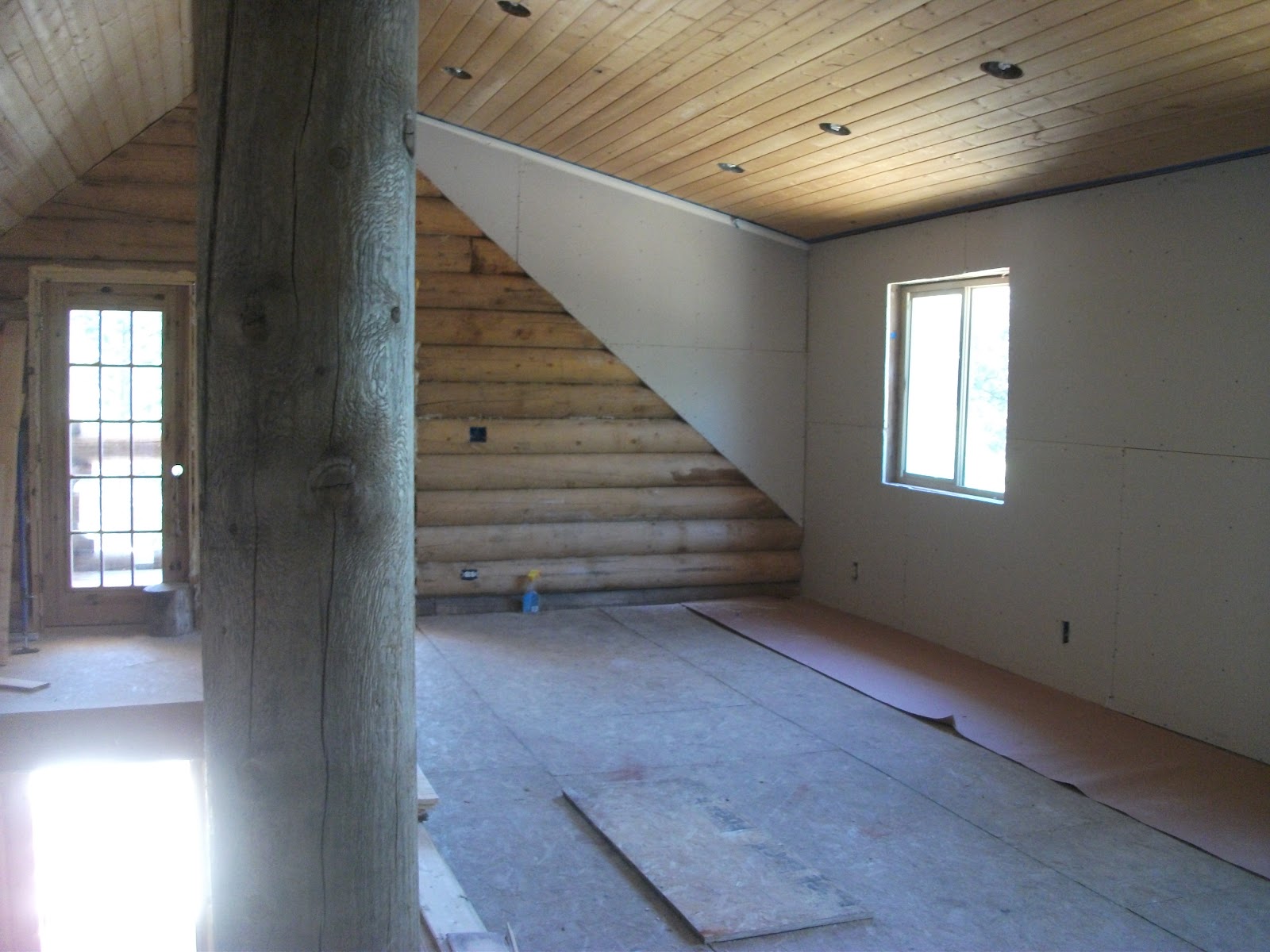 LOG CABIN: Drywall and fire place mantel June 20, 2012