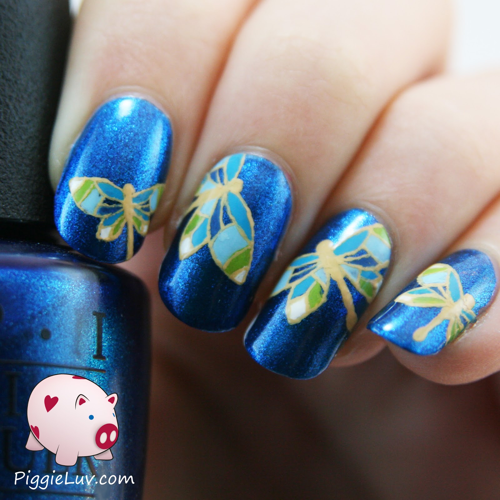 PiggieLuv: Blue dragonfly nails for Autism