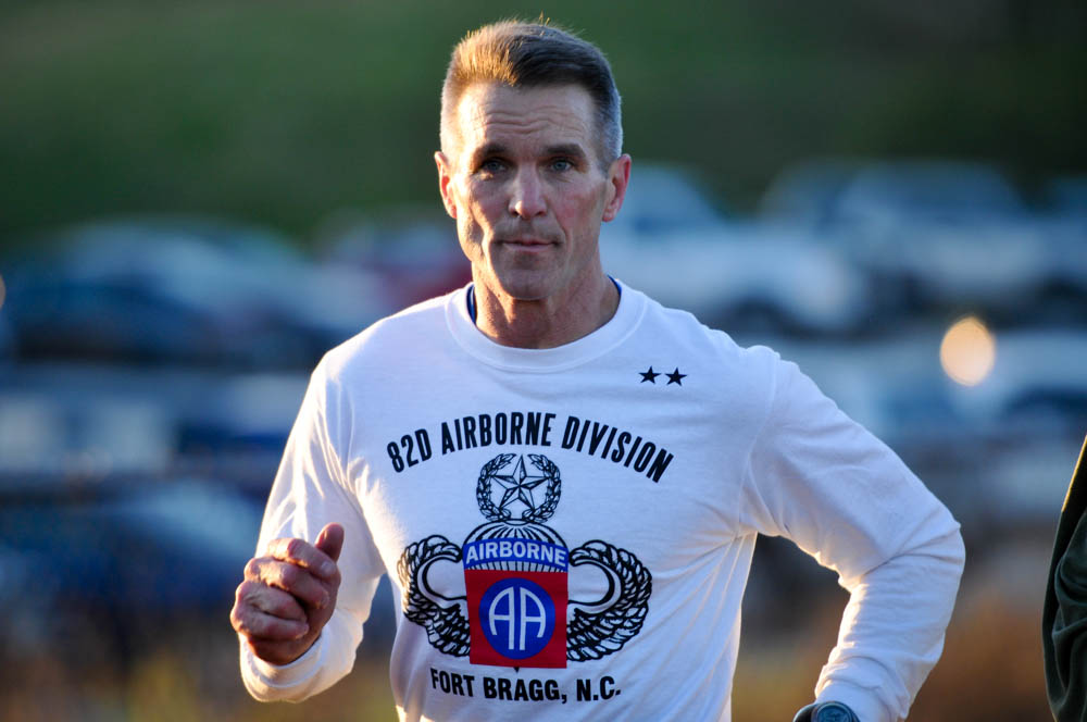 SNAFU!: Maj. Gen. Richard Clarke performs a pull-up ... pic by Staff ...